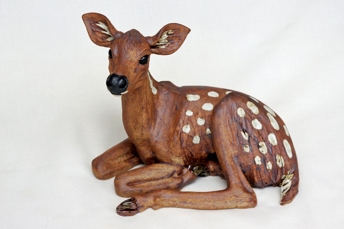 Deer Fawn, curled up with his head raised - Pippa Hill Animal Sculpture